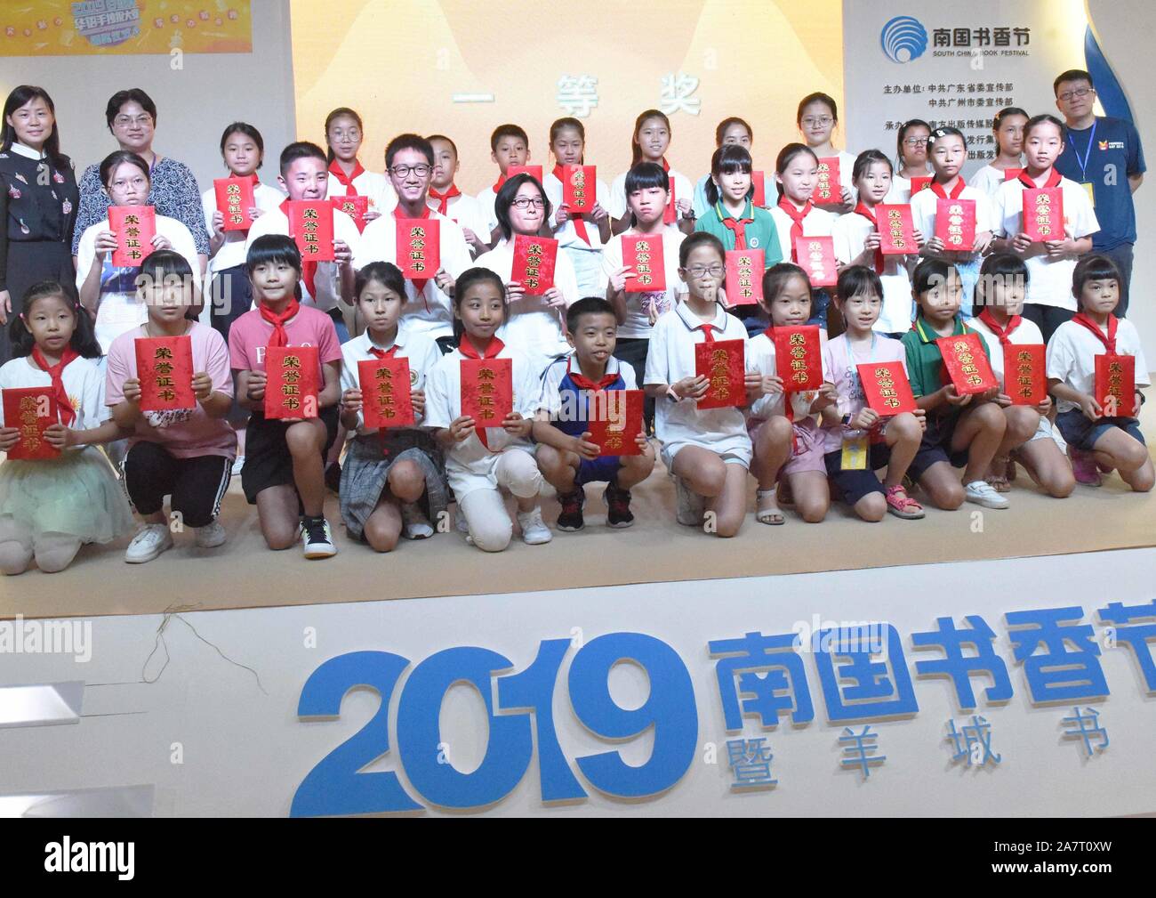 Students receive awards during Chinese self-designed newspaper ...