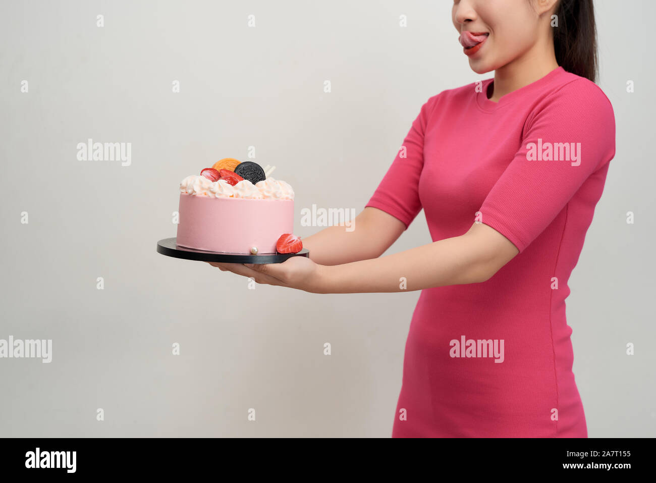 Holds her birthday cake hi-res stock photography and images - Alamy