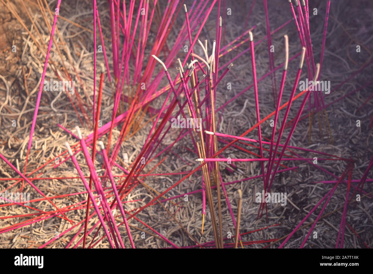 Burning pink incense sticks and ashes at ancient Kaiyuan Buddhist ...