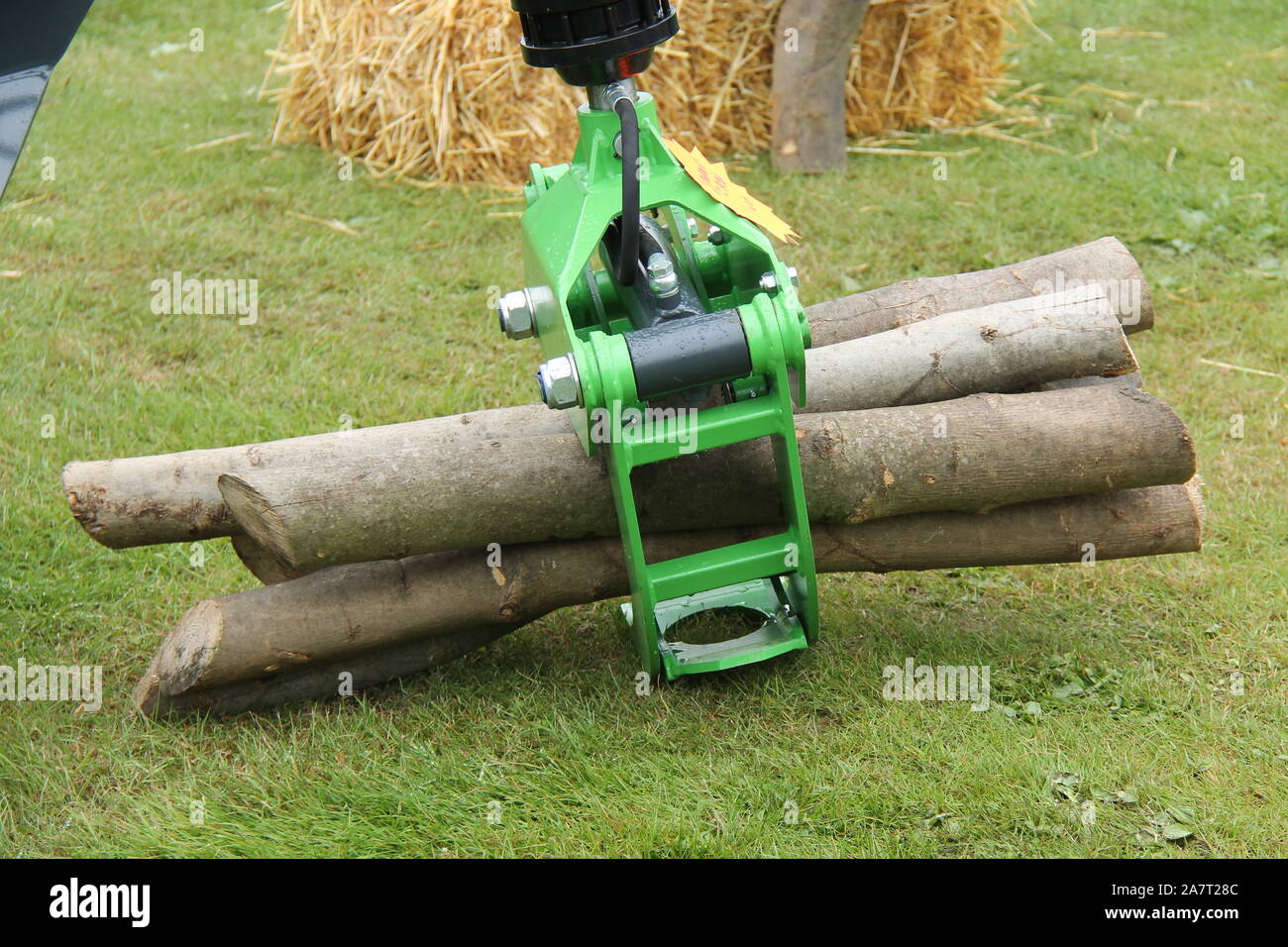A Farming Attachment to Lift and Carry Wooden Logs Stock Photo - Alamy
