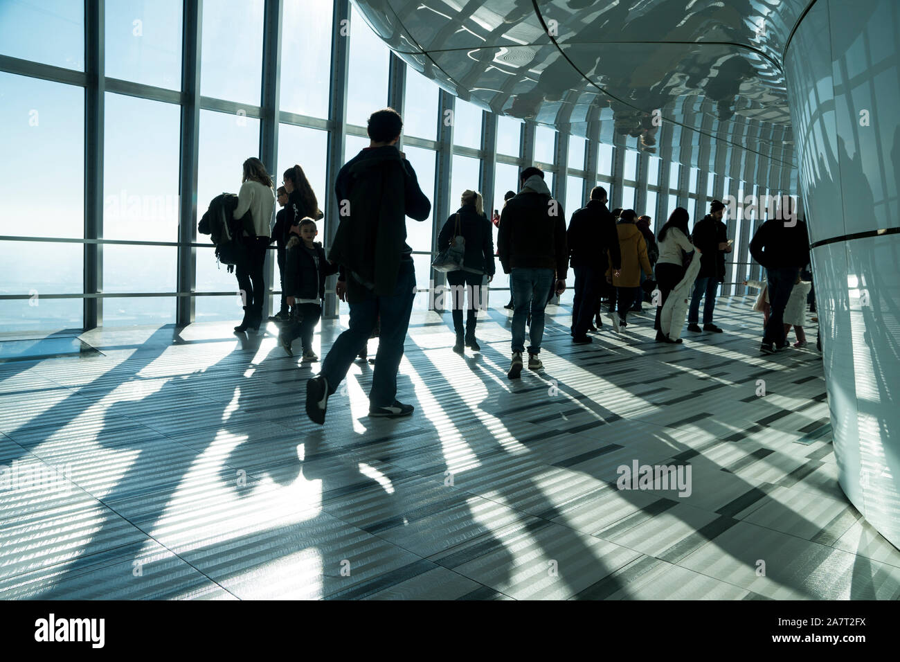 Milan Italy: people admire the view on Milan from the windows of ...