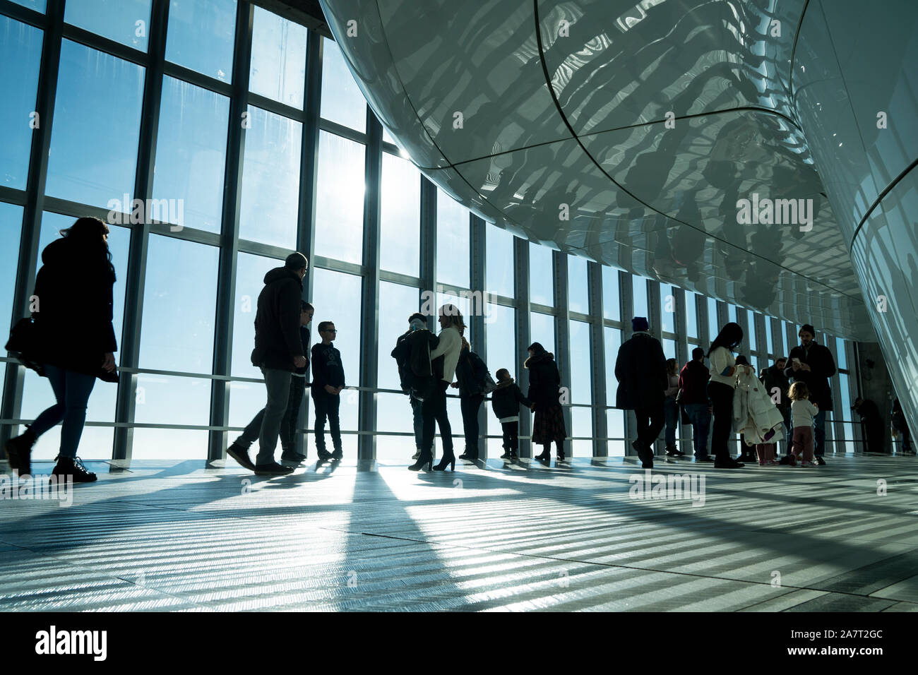 Milan Italy: people admire the view on Milan from the windows of ...