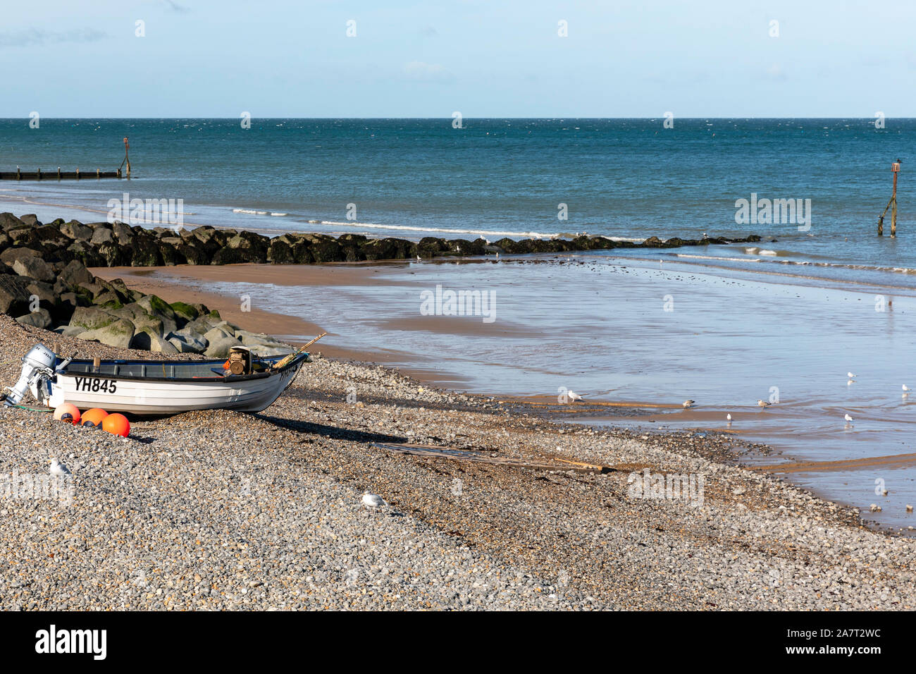 Sheringham Beach with Boat Stock Photo - Alamy