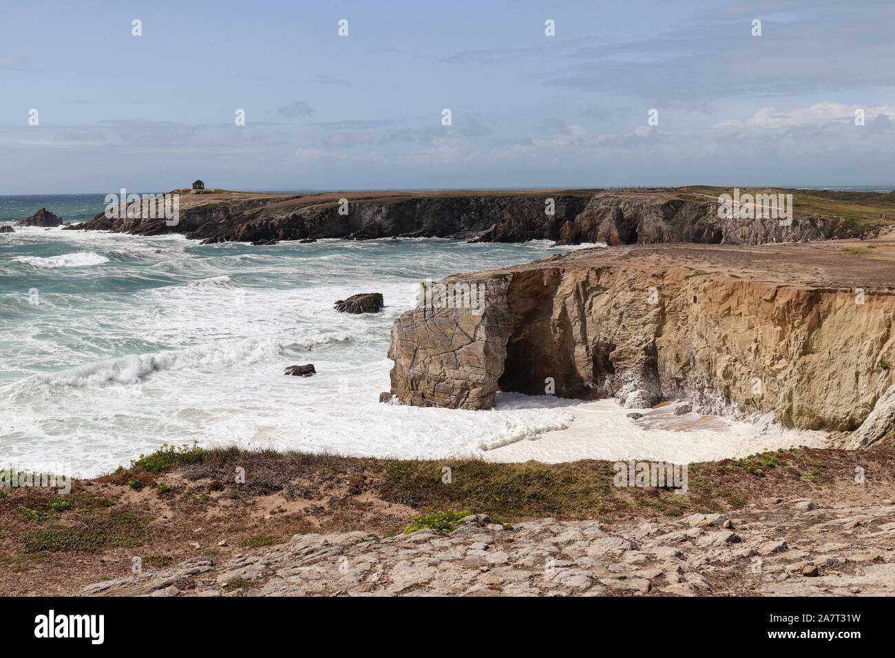 Spectacular cliffs and stone arch Arche de Port Blanc on famous ...