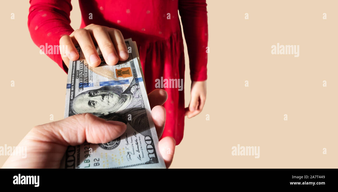 Child giving money to parent hi-res stock photography and images - Alamy