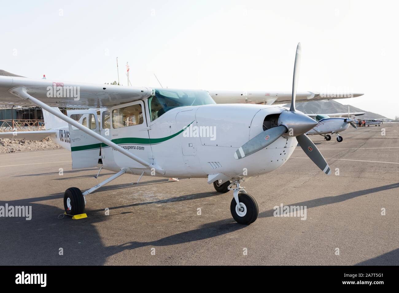 PERU, NAZCA- circa OCTOBER, 2019: small airplane takes 6 tourists on ...