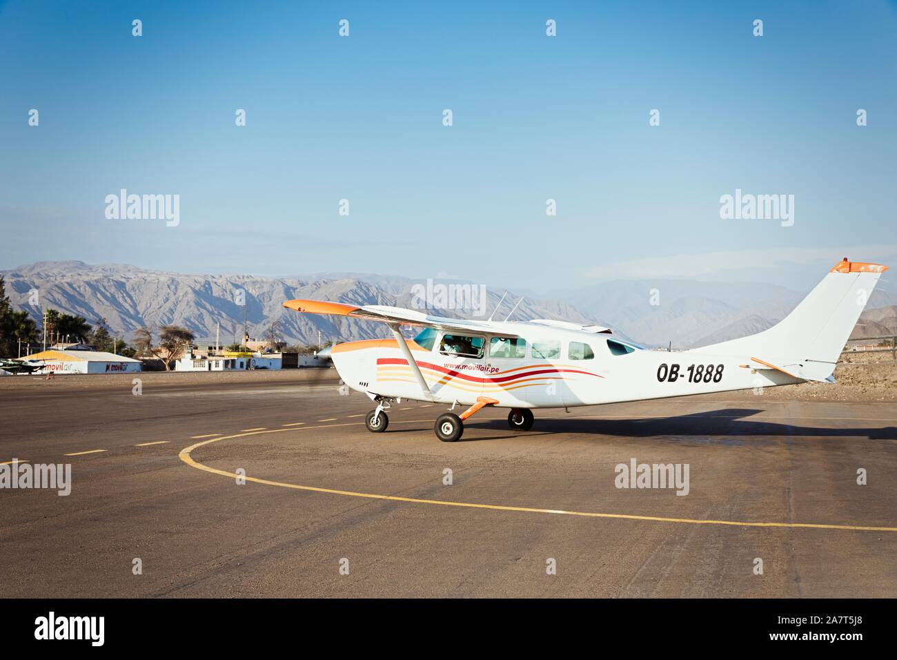 PERU, NAZCA- circa OCTOBER, 2019: small airplane takes 6 tourists on ...