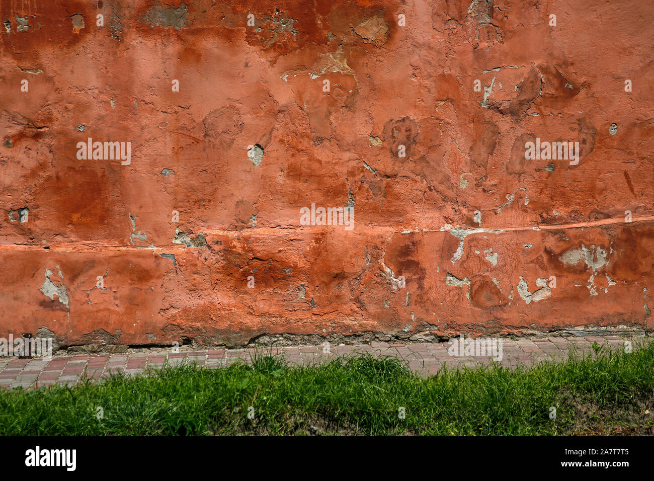 old peeling red stone wall Stock Photo - Alamy