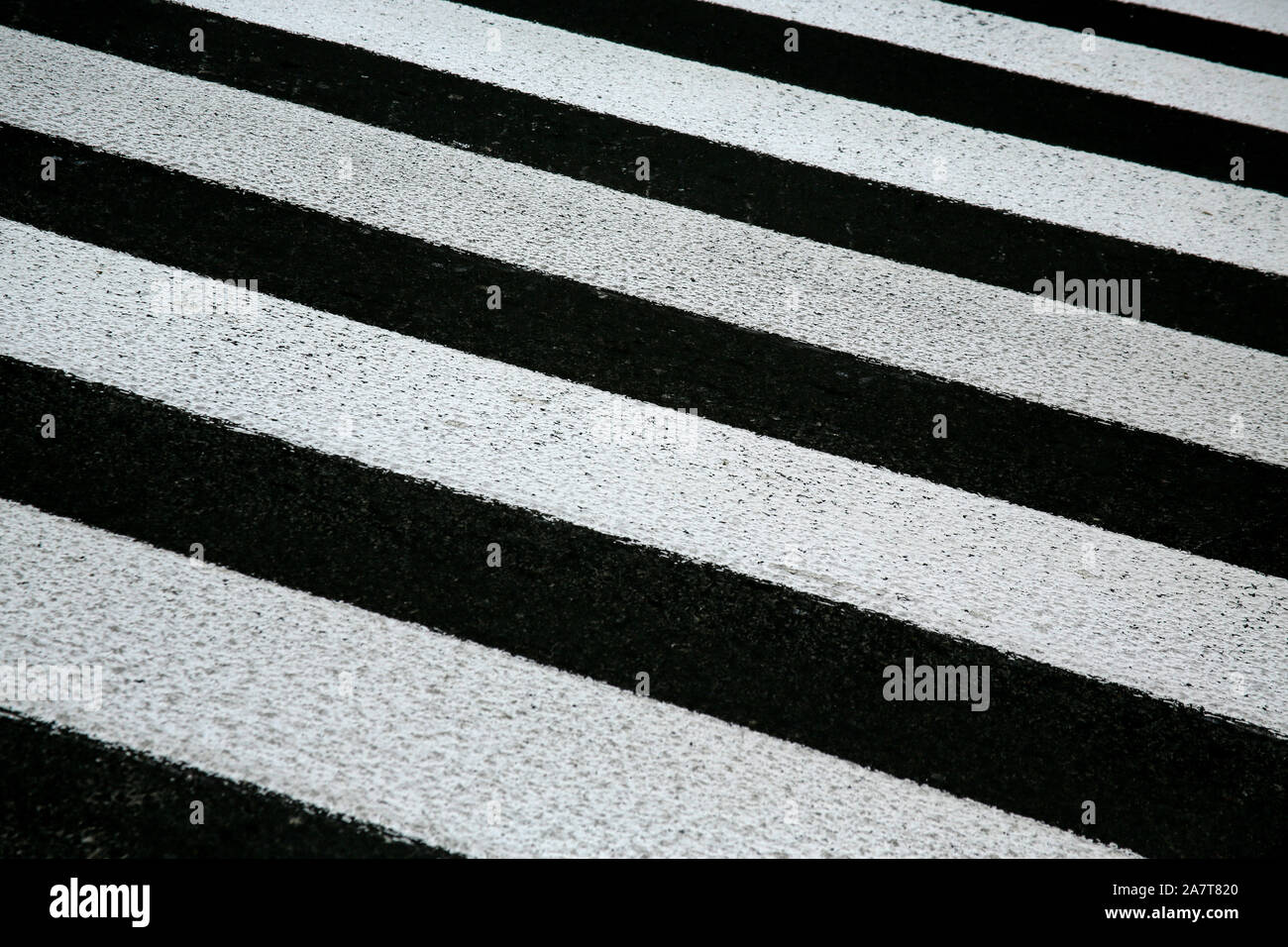 zebra crosswalk on a asphalt road background Stock Photo - Alamy