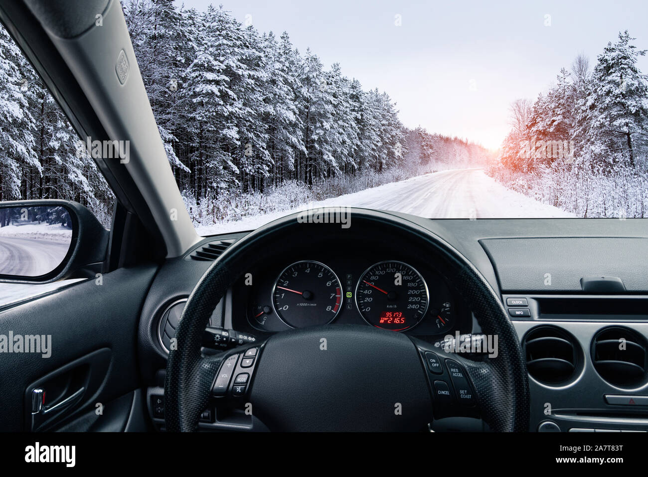 Car on a winter road Stock Photo - Alamy
