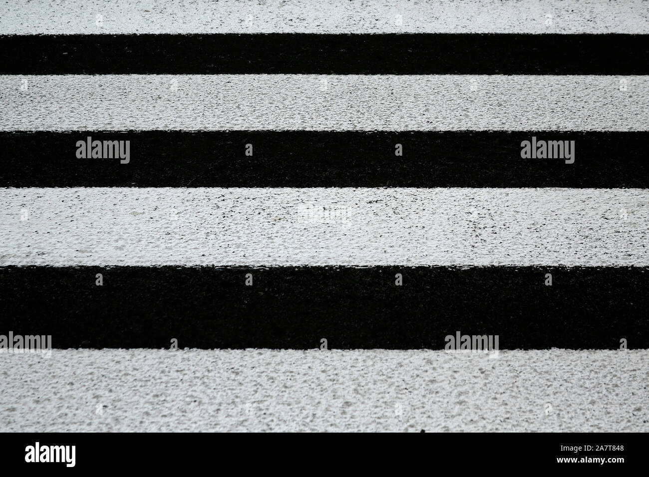 zebra crosswalk on a asphalt road background Stock Photo - Alamy