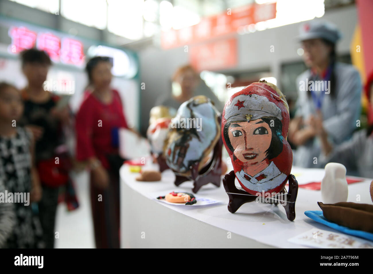 Stone paintings featuring Chinese Red Army are displayed to mark the ...