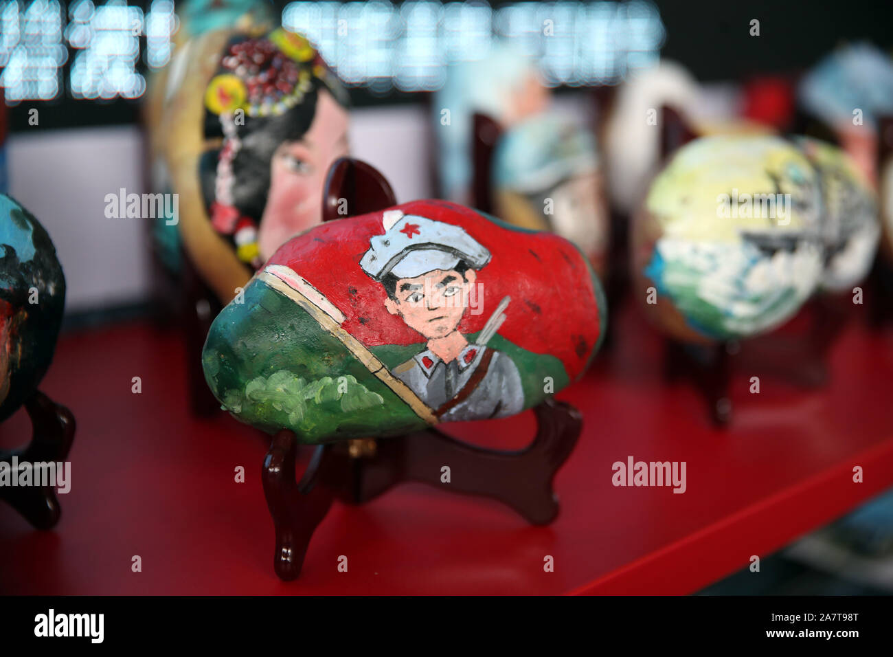 Stone paintings featuring Chinese Red Army are displayed to mark the ...