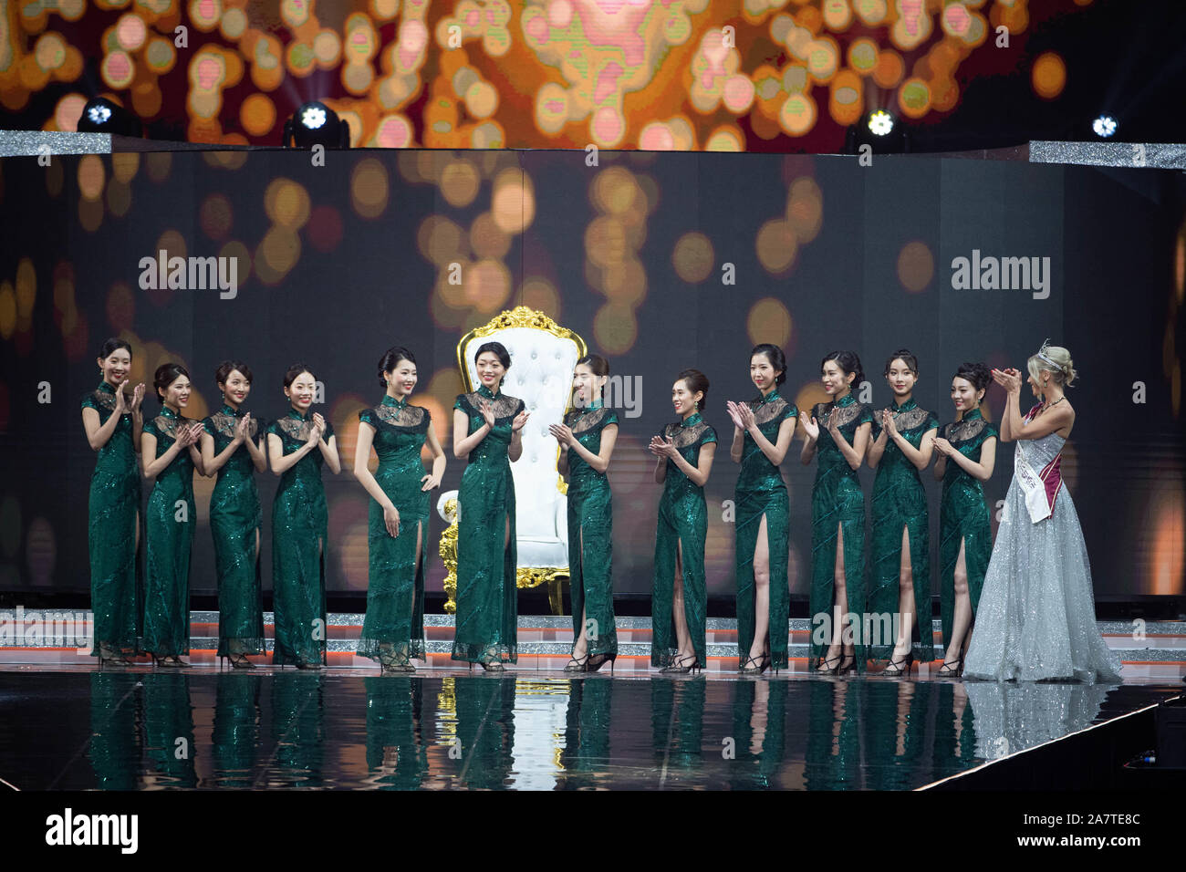 Contestants pose during the 2019 Miss Macau Pageant contest in Macau ...