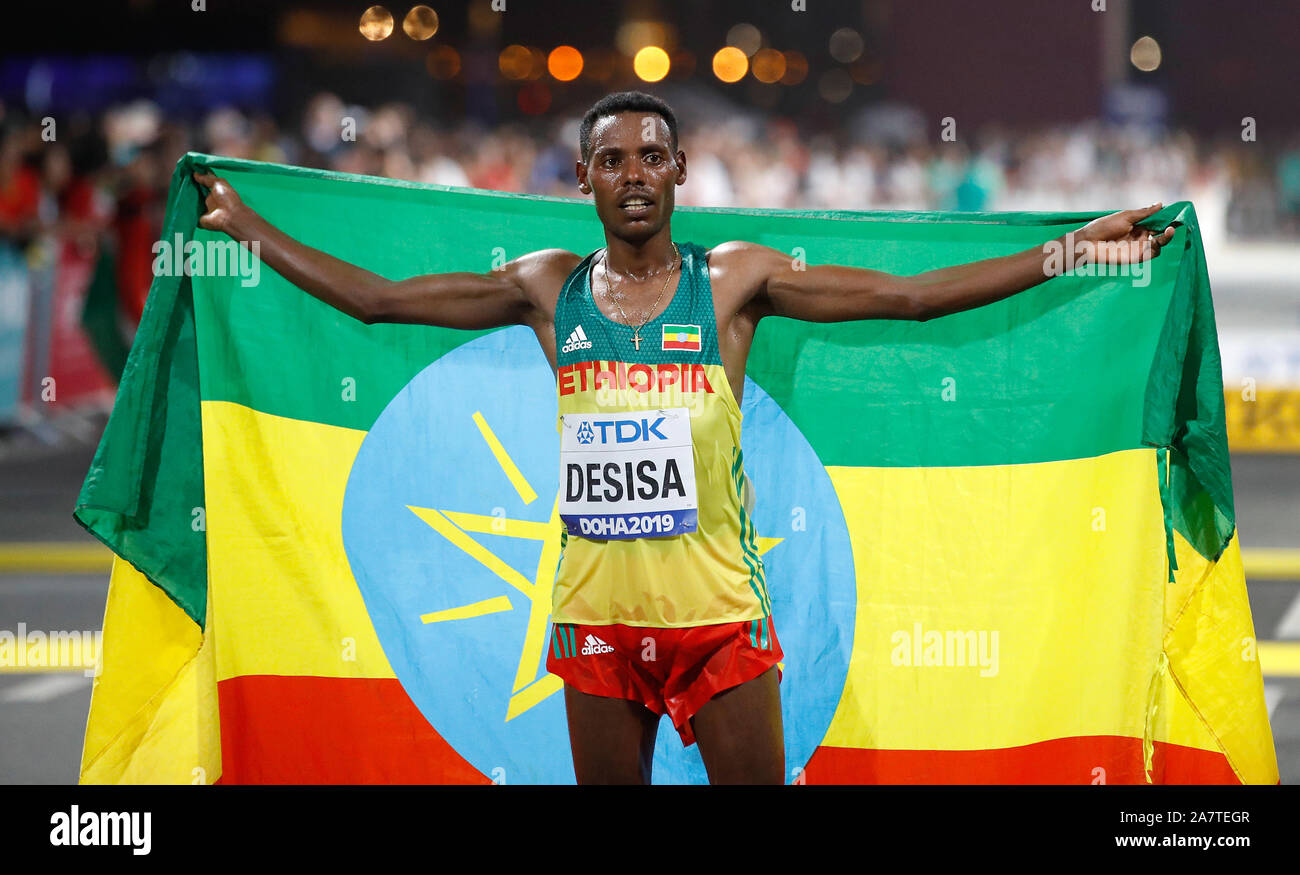 Ethiopia's Lelisa Desisa celebrates winning the Mens Marathon Stock ...