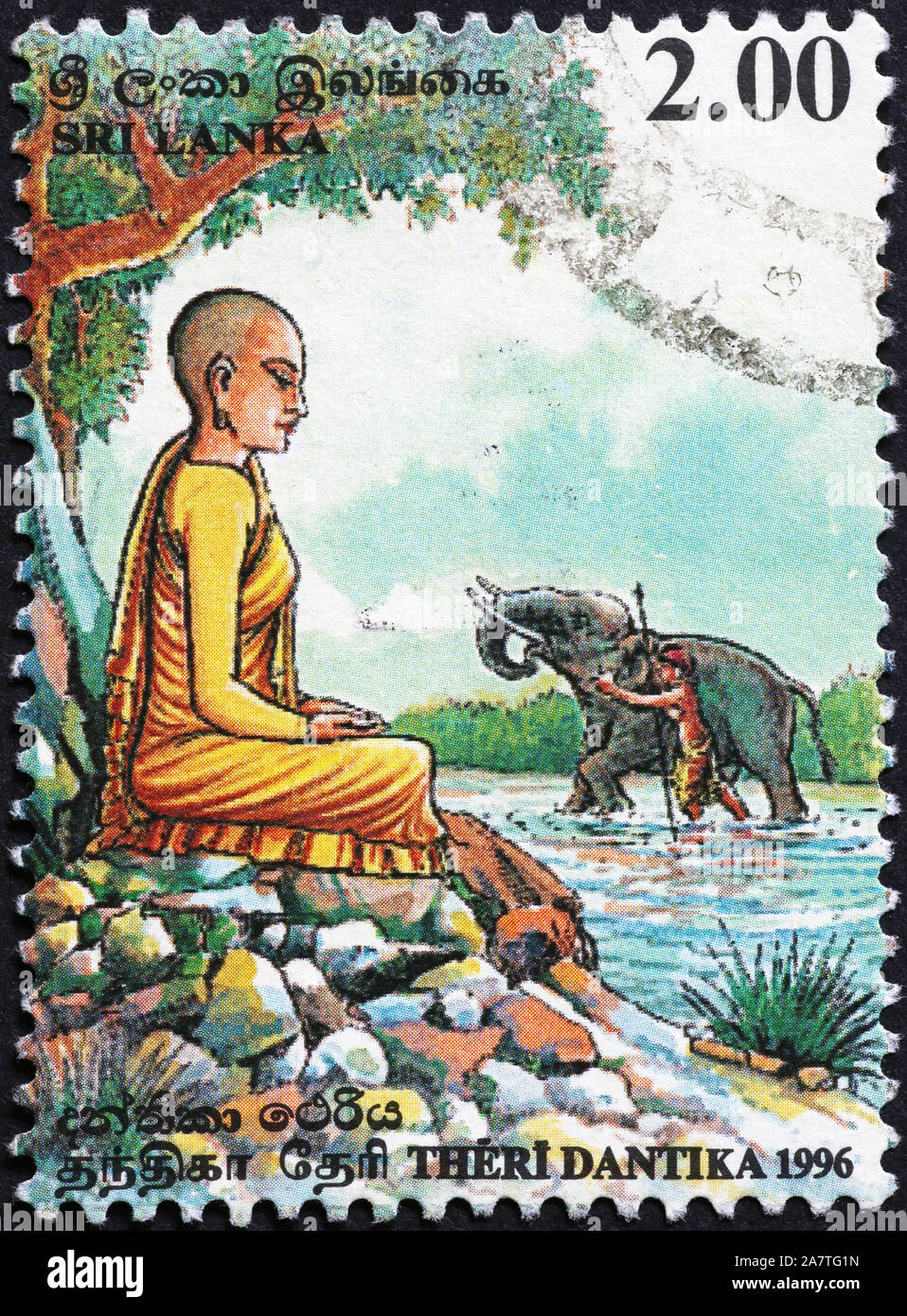 Meditating Buddha on postage stamp of Sri Lanka Stock Photo - Alamy