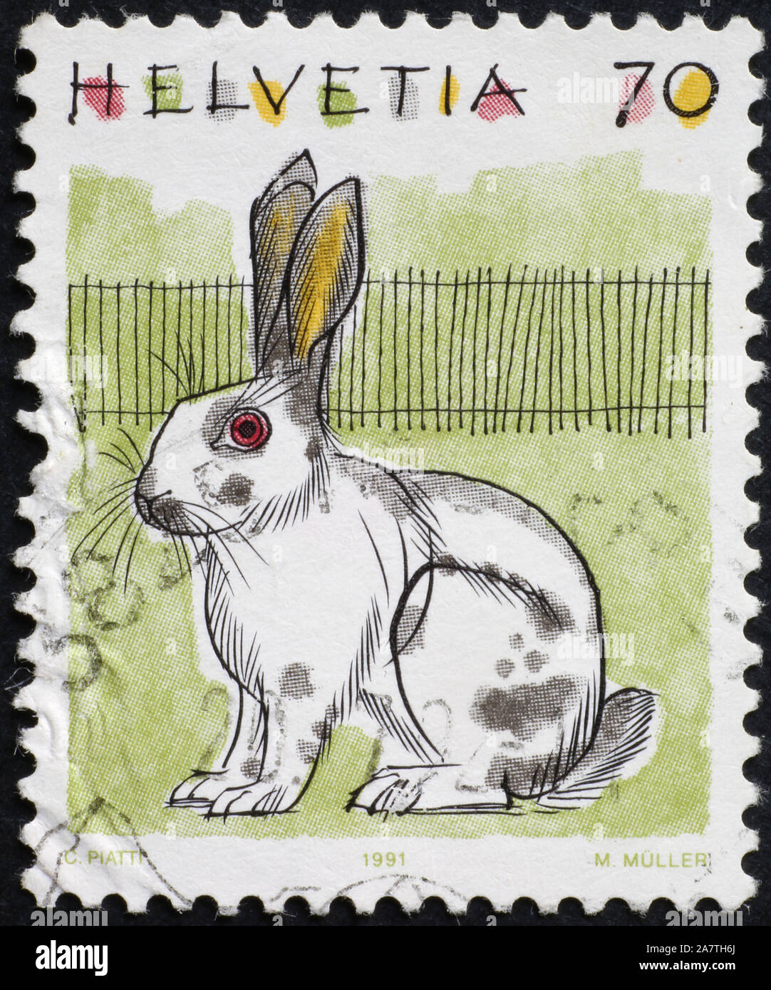 Drawing of rabbit on swiss postage stamp Stock Photo - Alamy