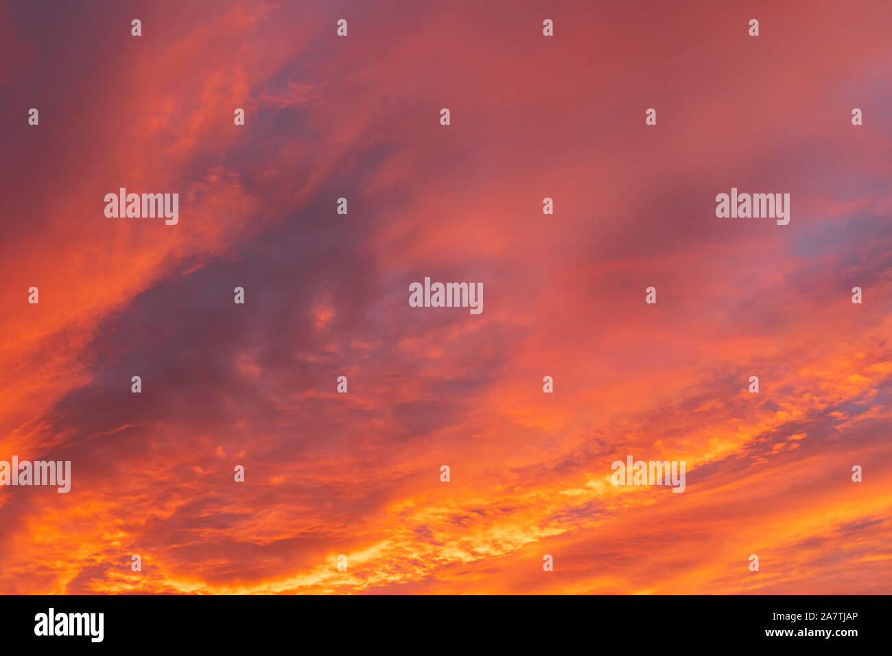Dramatic vibrant fiery sky sunset cloudscape at dusk Stock Photo - Alamy