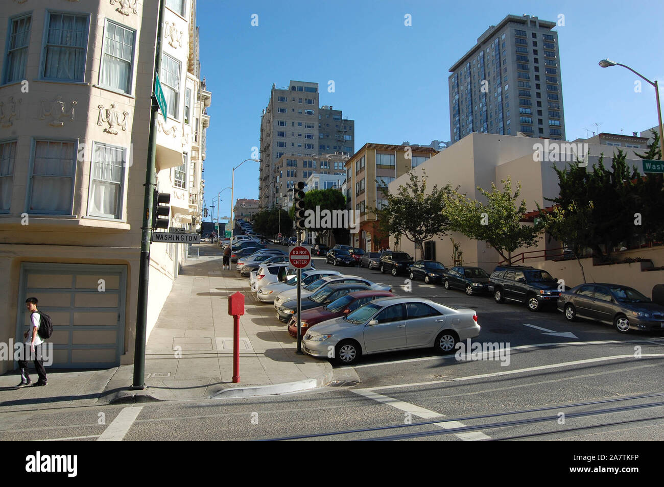 Downtown San Francisco hill with cars parked sign saying Washington ...