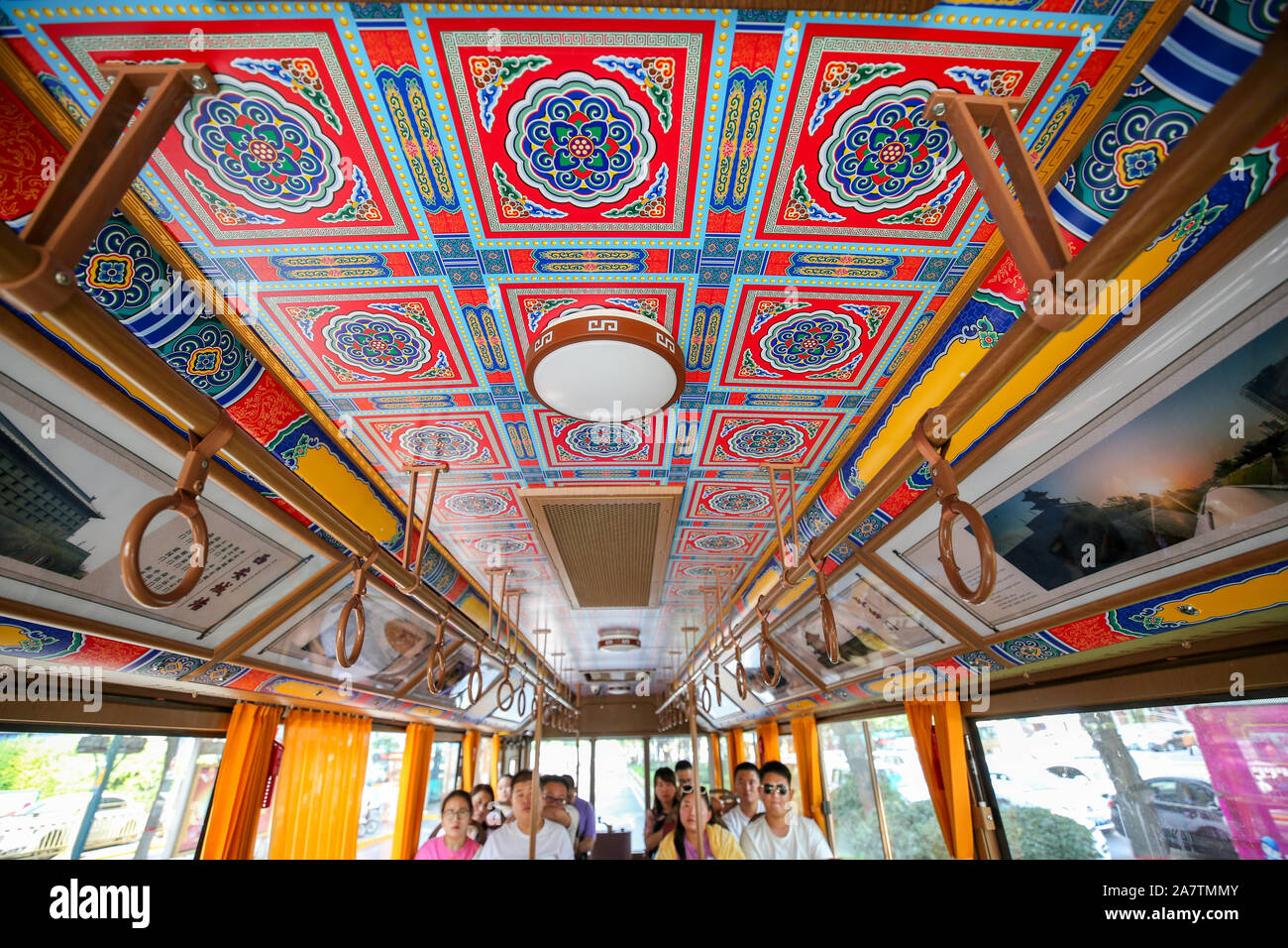 Passengers experience the old-fashioned bus in Xi’an city, northwest ...
