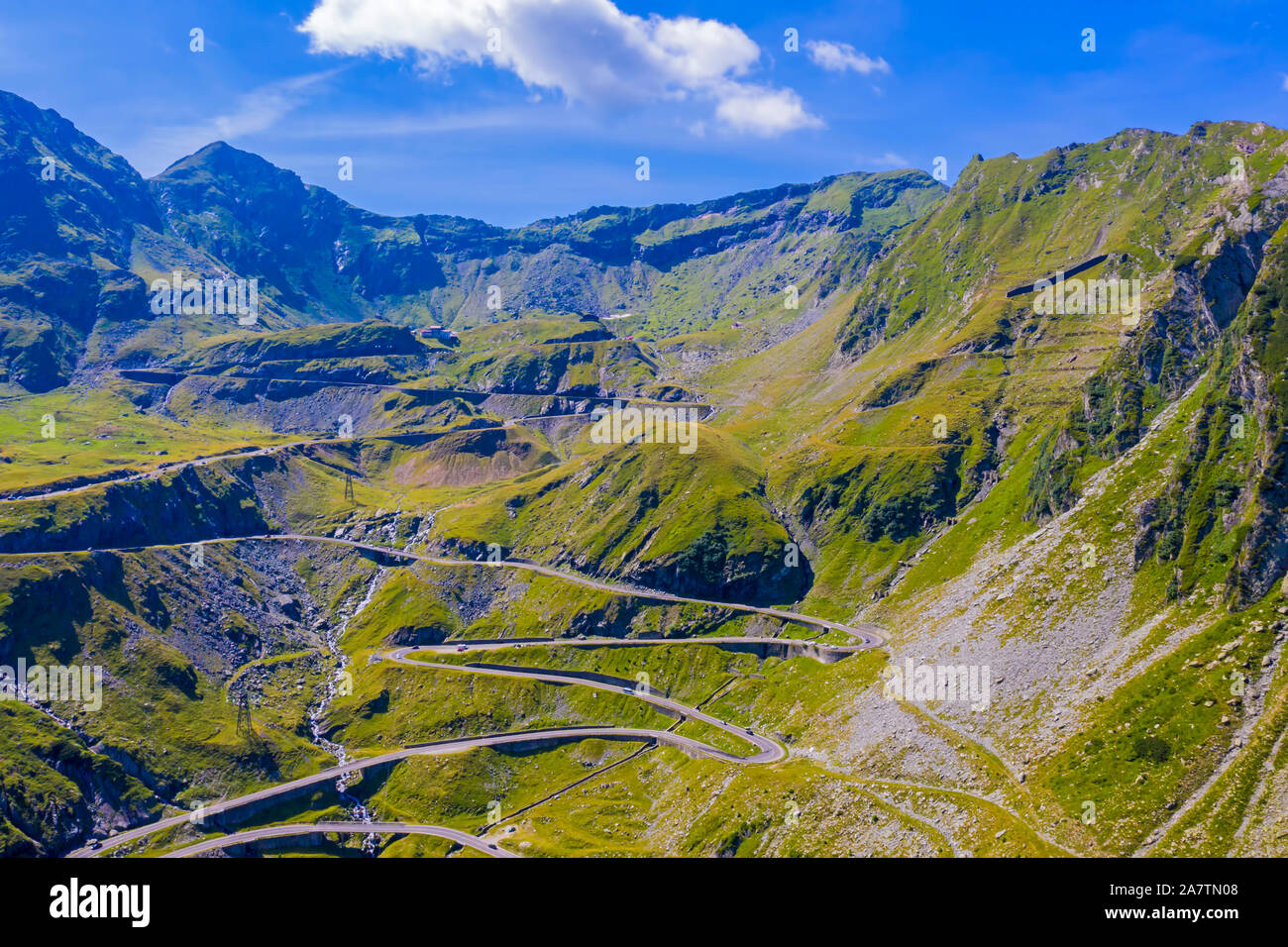 Aerial view of winding road in Romanian Carpathians, summer view of ...