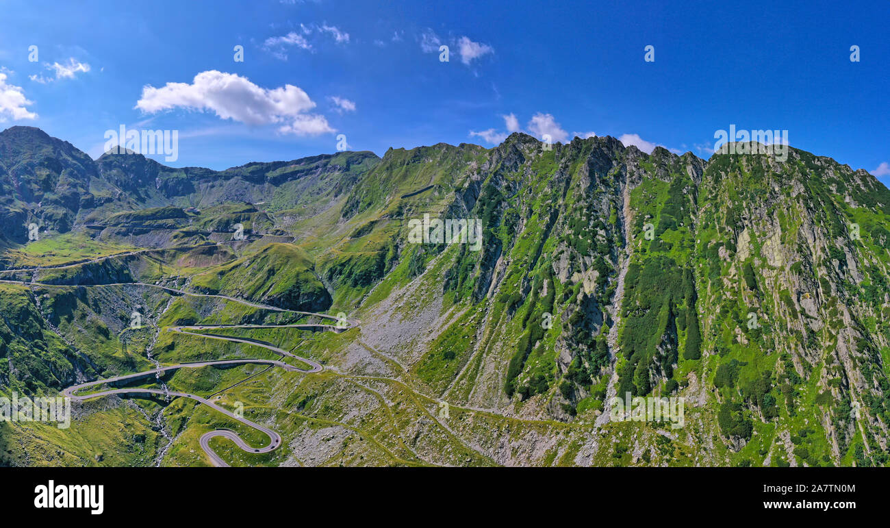 Aerial view of winding road in Romanian Carpathians, summer view of ...