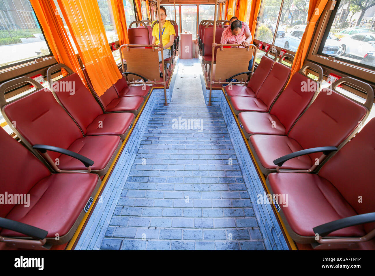 Passengers experience the old-fashioned bus in Xi’an city, northwest ...
