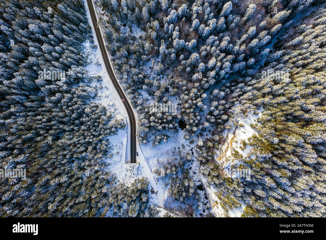 Winter road in tunnel entrance. Bicaz gorge is a narrow pass between ...