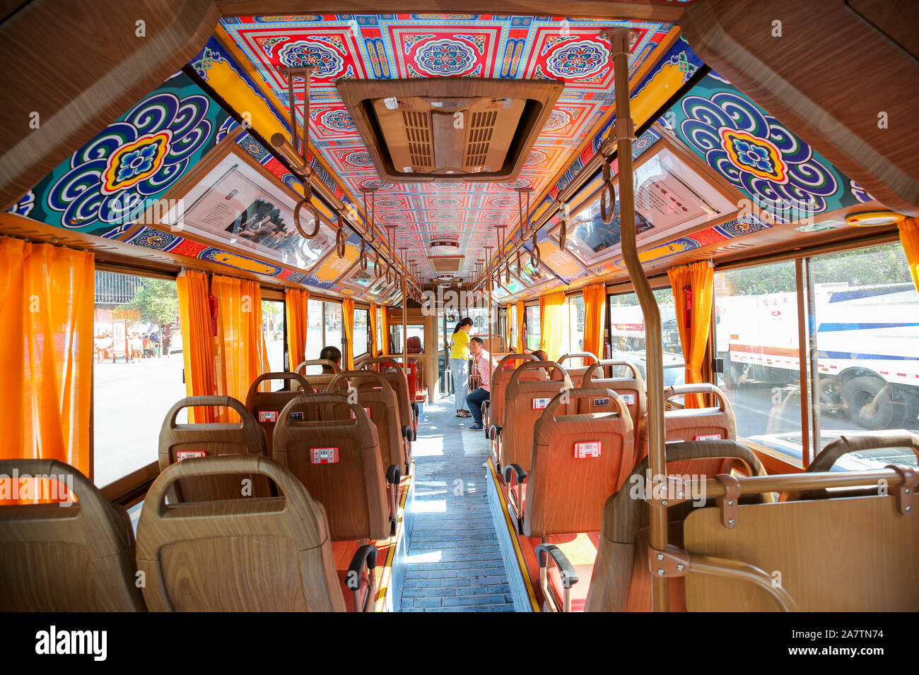 Passengers experience the old-fashioned bus in Xi’an city, northwest ...