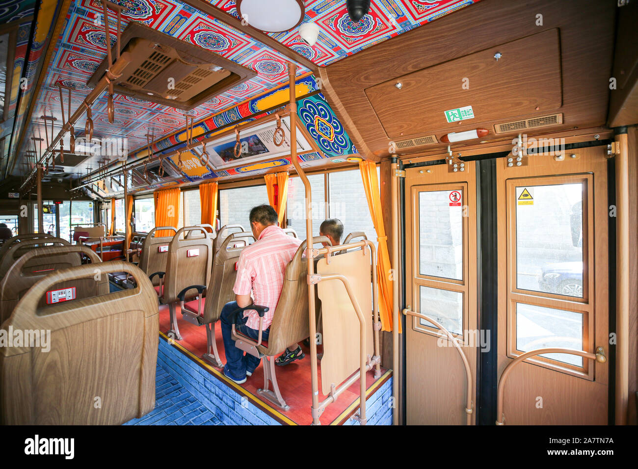 Passengers experience the old-fashioned bus in Xi’an city, northwest ...