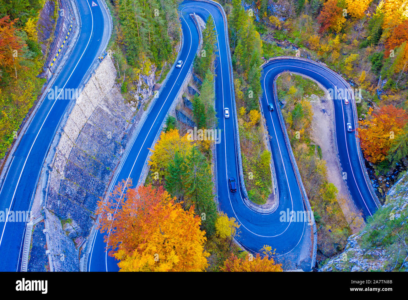 Autumn serpentine road in Romanian Carpathians. Bicaz Gorges are a ...