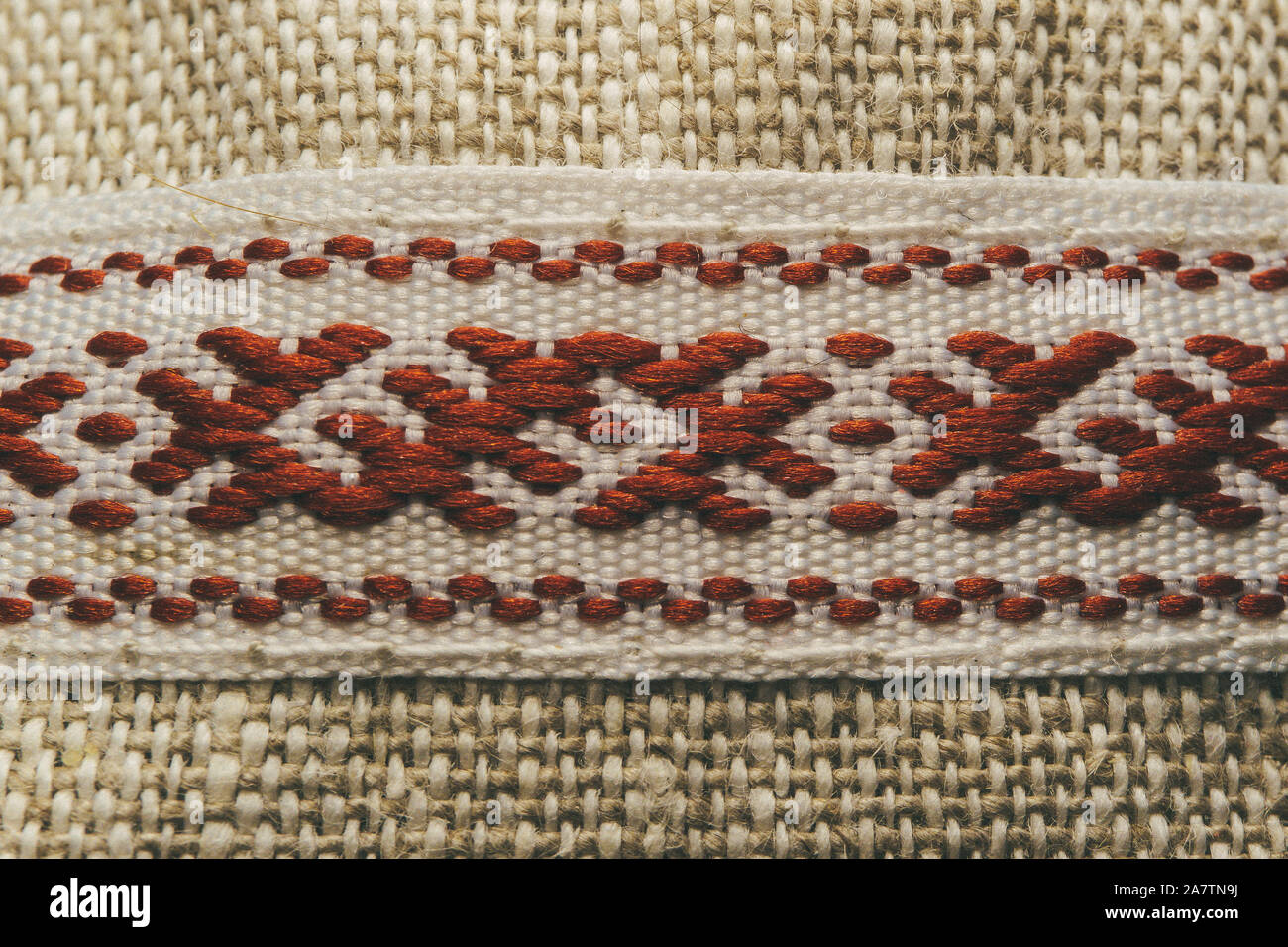 Artistic close-up of warm traditional symbolic burgundy red national ...