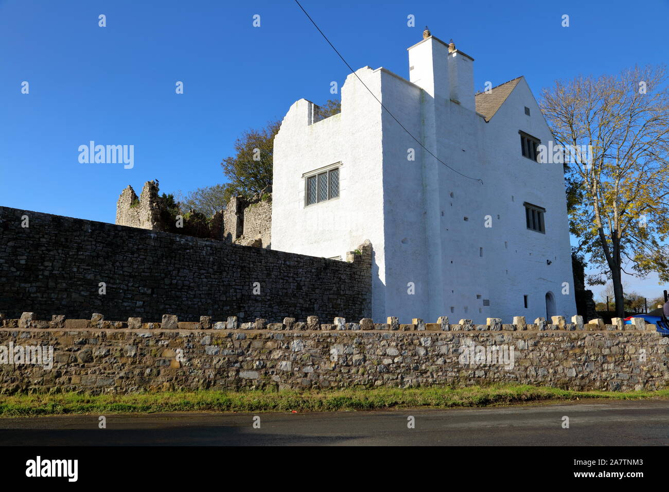 A ruined and now partially restored village castle showing life after ...