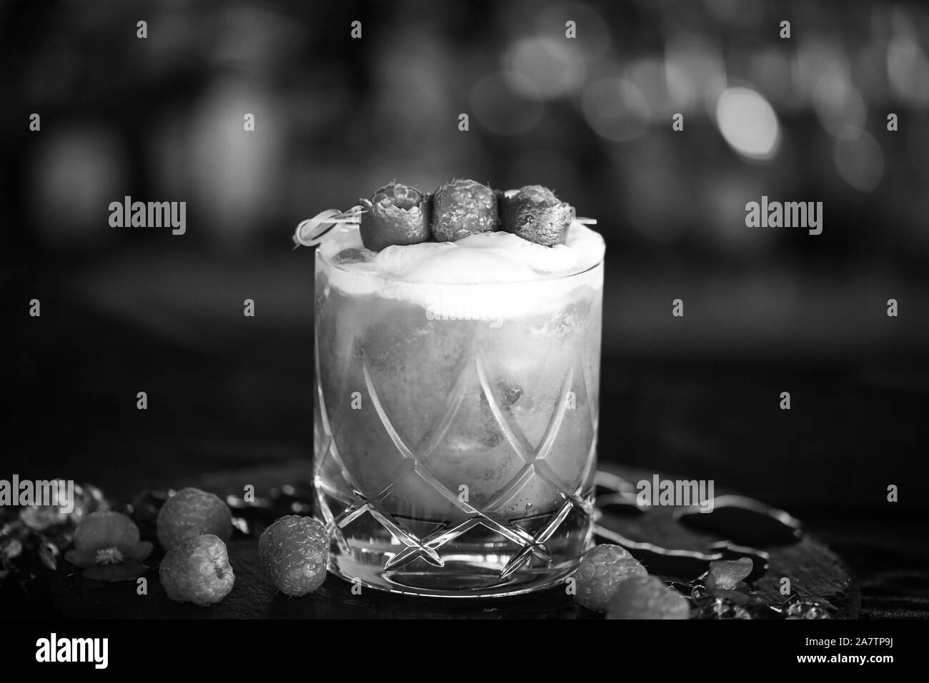 raspberry & lime cocktail with fresh egg foam Stock Photo - Alamy