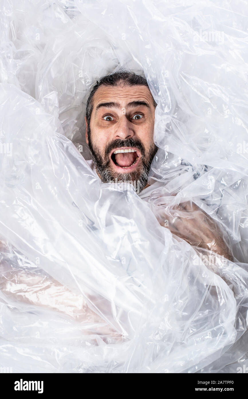 Wrapped in sheet hi-res stock photography and images - Alamy