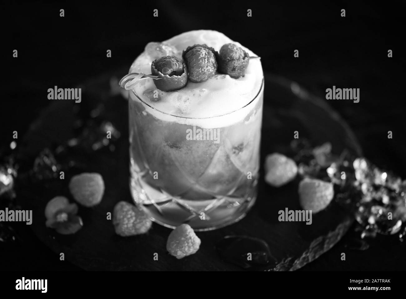 raspberry & lime cocktail with fresh egg foam Stock Photo - Alamy