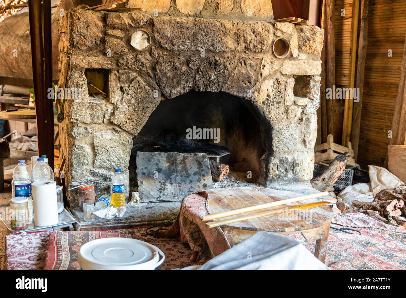 Rustic stone built wood burning oven in a small old restaurant in ...