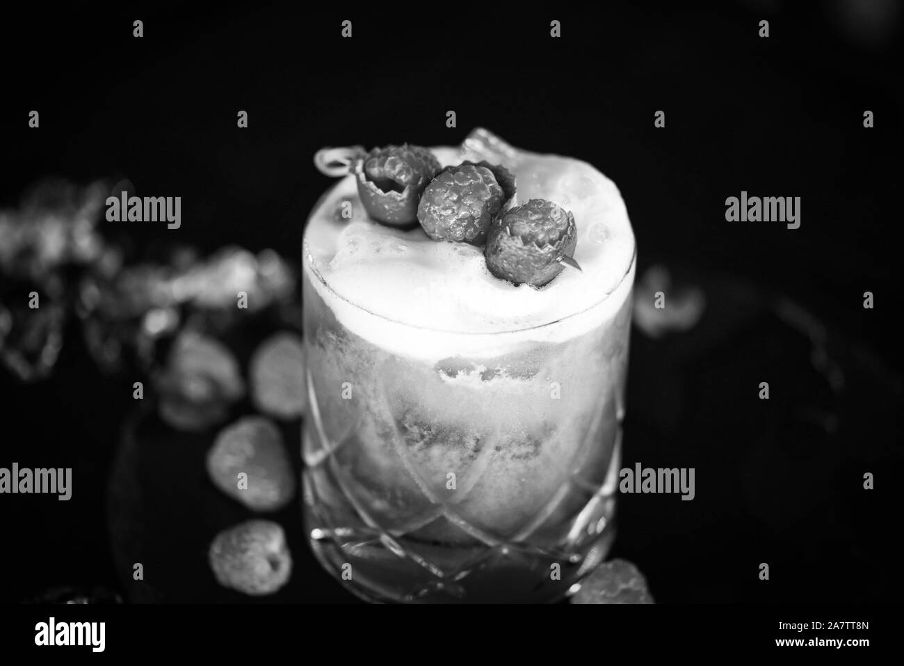 raspberry & lime cocktail with fresh egg foam Stock Photo - Alamy