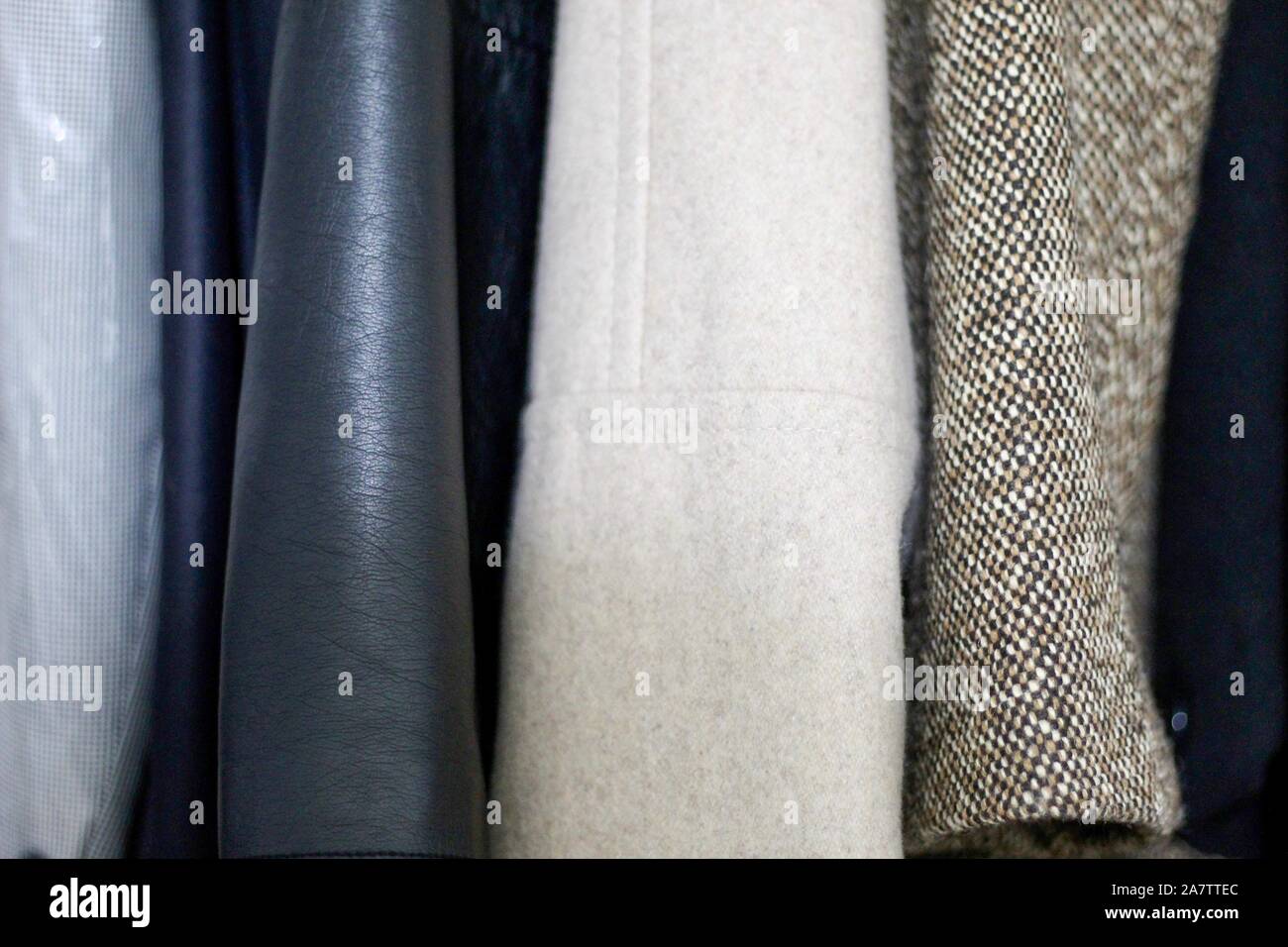 Hanging up coats hi-res stock photography and images - Alamy