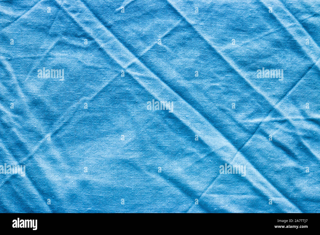 crumpled blue linen fabric background Stock Photo - Alamy