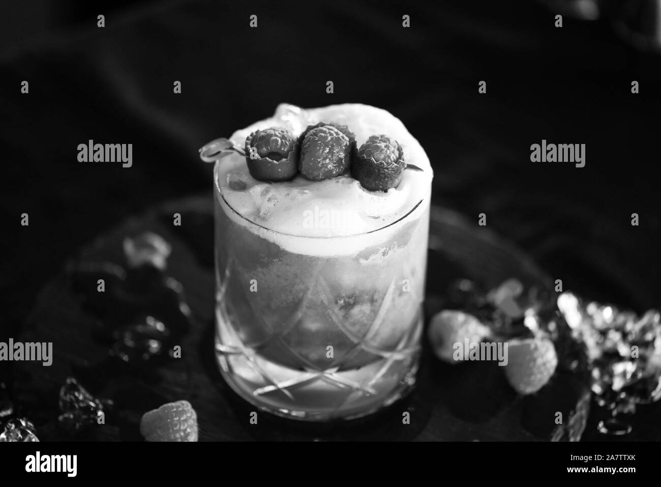 raspberry & lime cocktail with fresh egg foam Stock Photo - Alamy