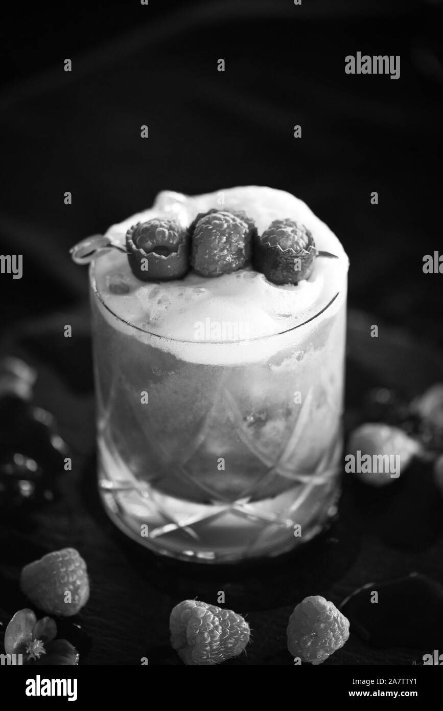 raspberry & lime cocktail with fresh egg foam Stock Photo - Alamy