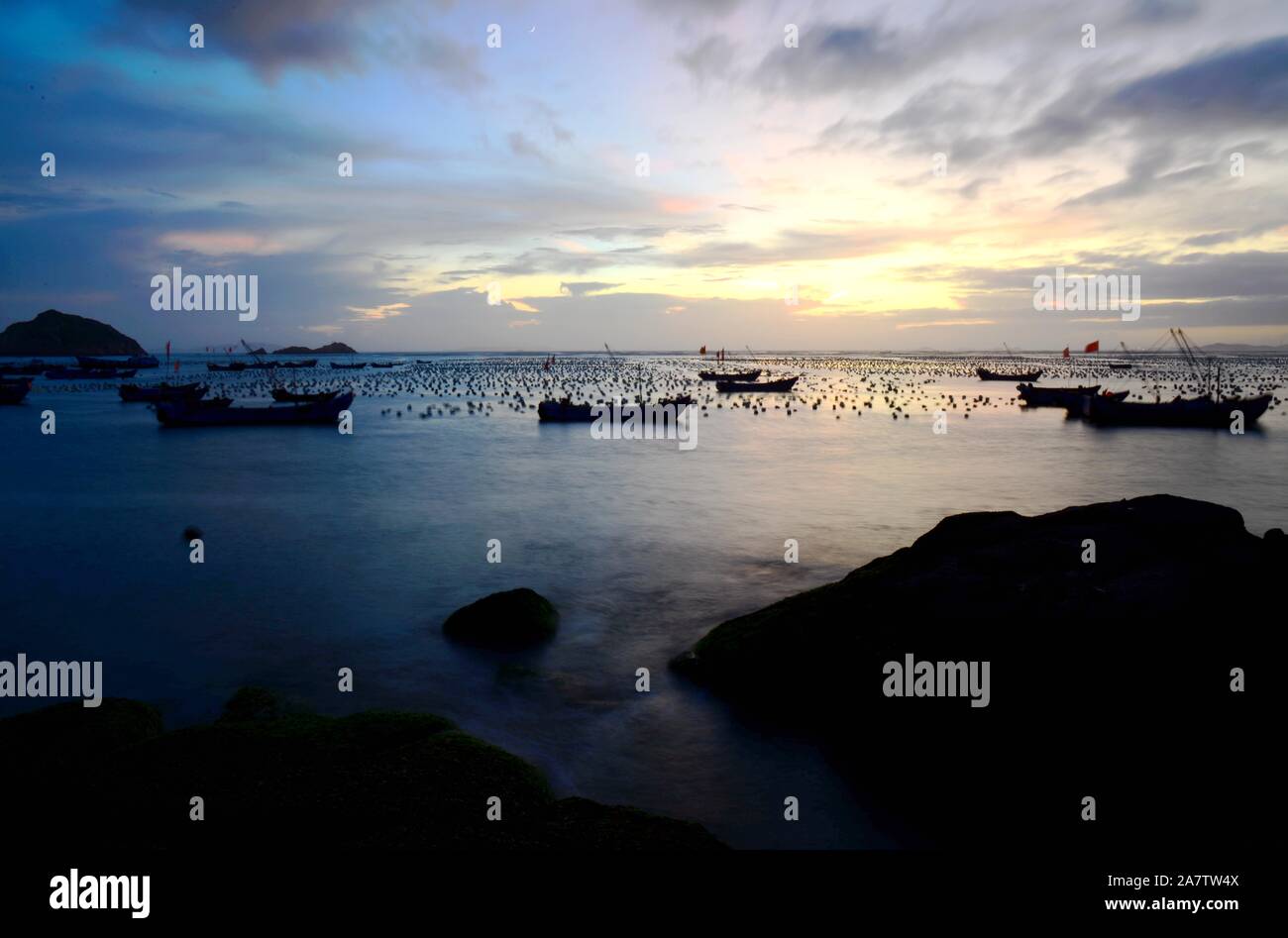 Fishing boats float around Goqi Island, the center of China's largest ...