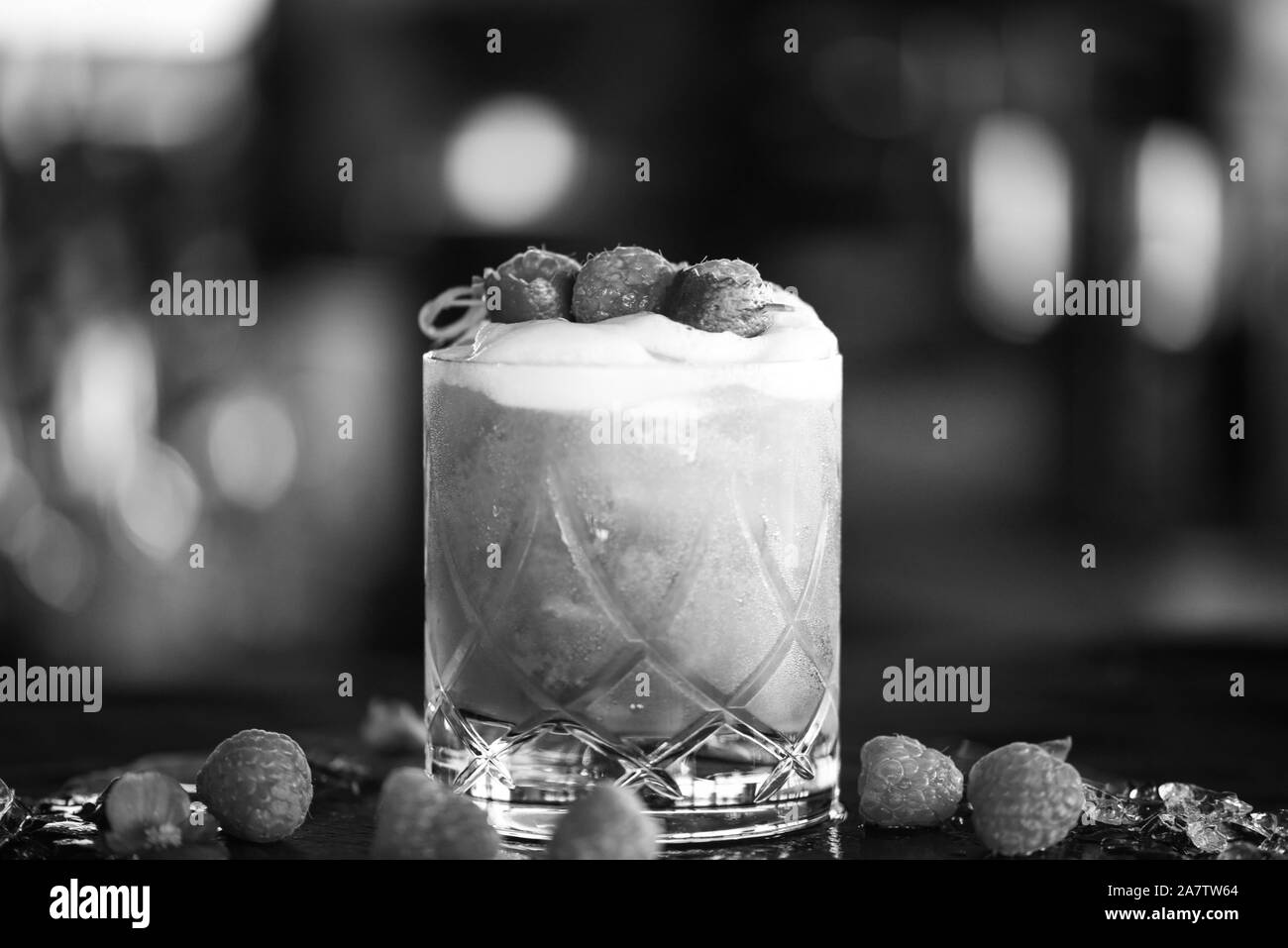 raspberry & lime cocktail with fresh egg foam Stock Photo - Alamy