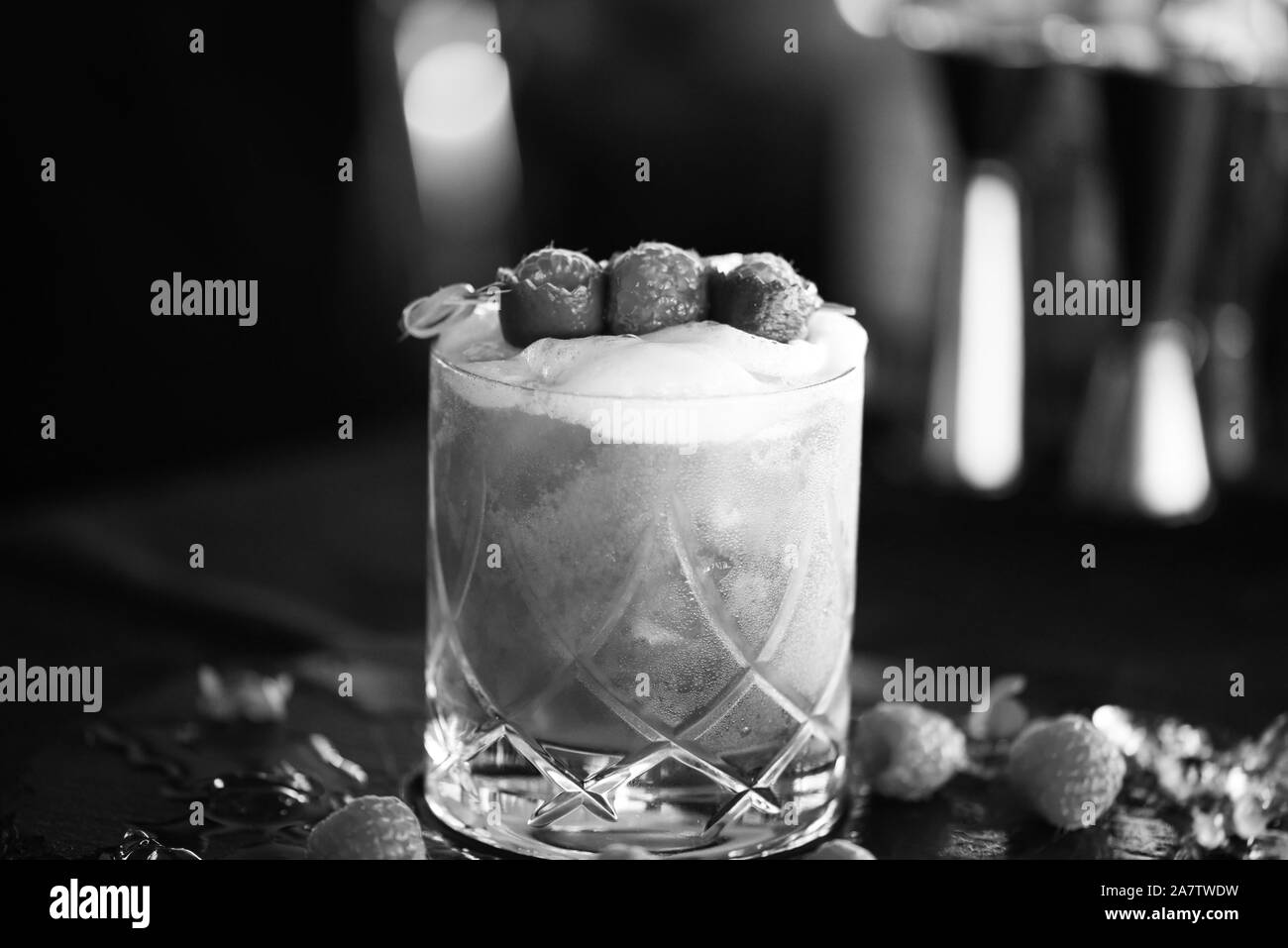 raspberry & lime cocktail with fresh egg foam Stock Photo - Alamy