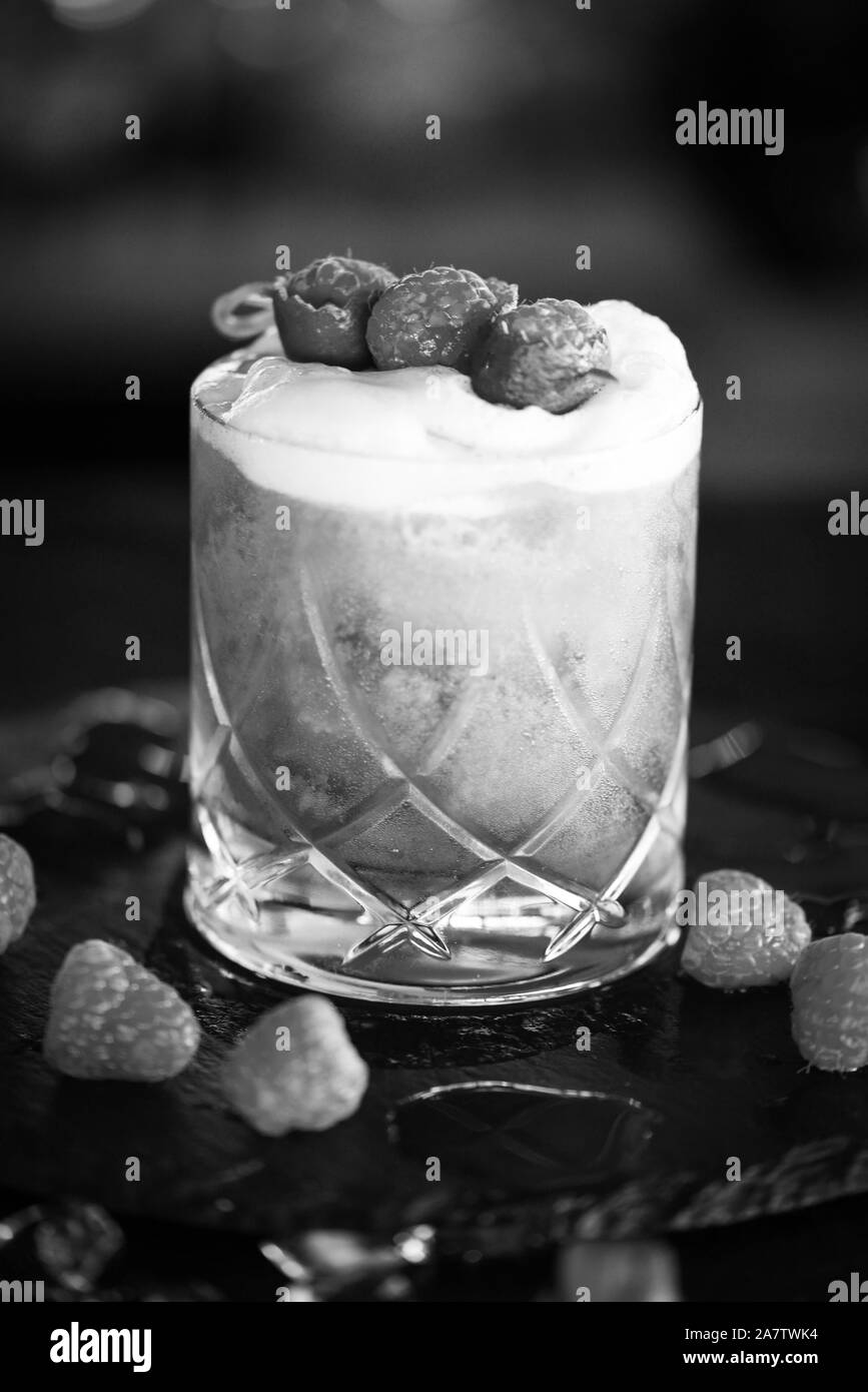 raspberry & lime cocktail with fresh egg foam Stock Photo - Alamy