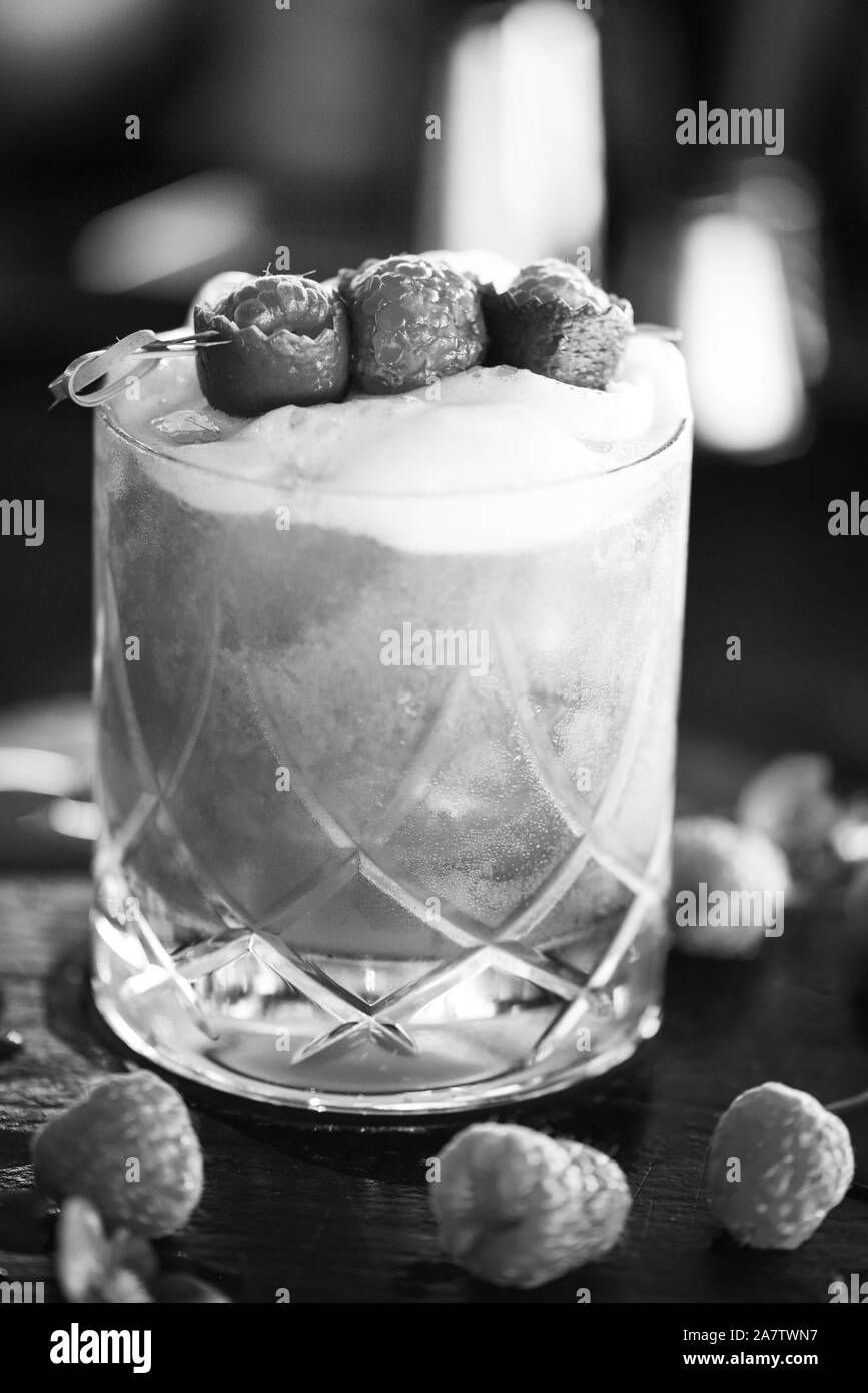 raspberry & lime cocktail with fresh egg foam Stock Photo - Alamy