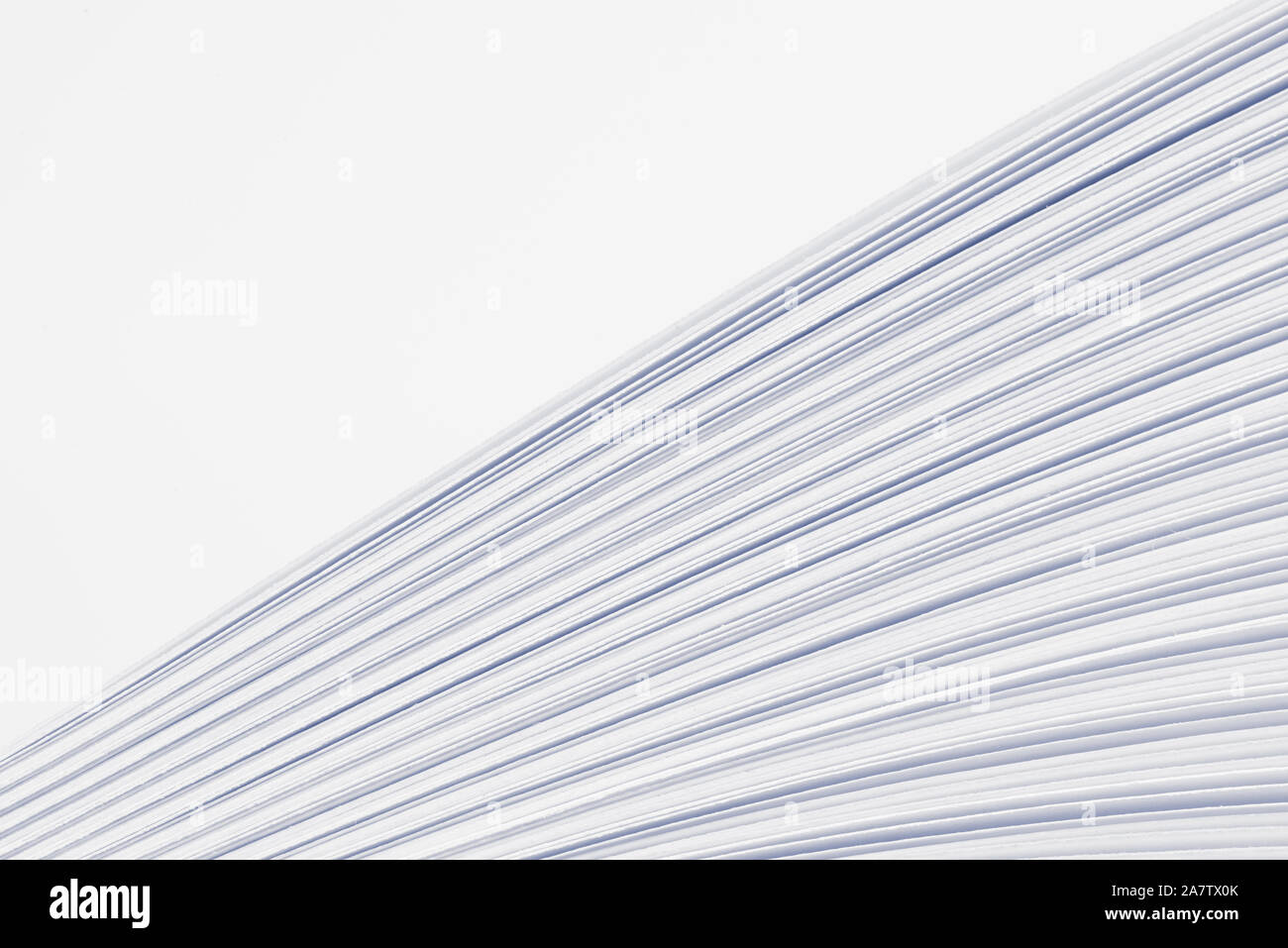 Bent stack of white paper sheets. Conceptual background of folded ...
