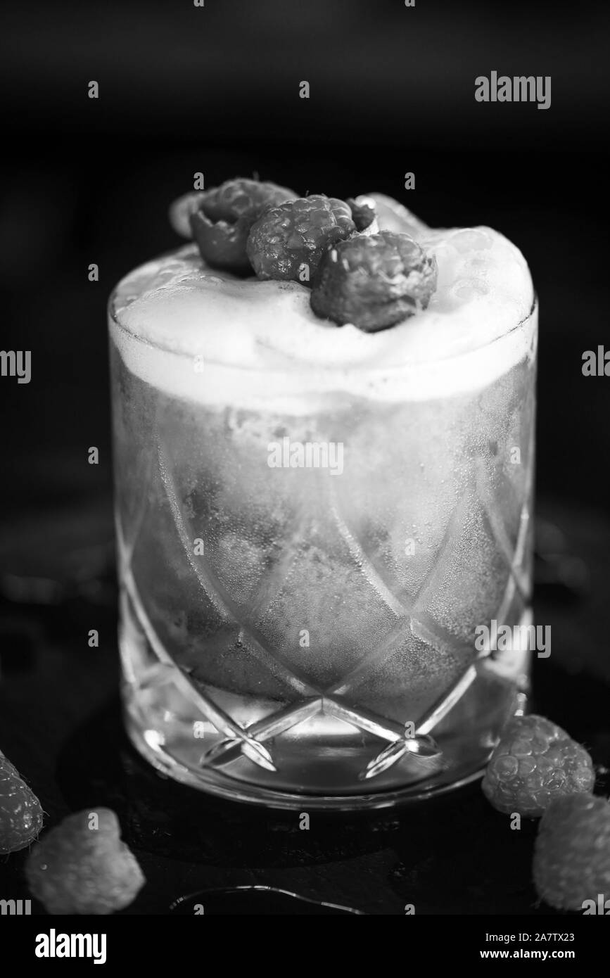 raspberry & lime cocktail with fresh egg foam Stock Photo - Alamy