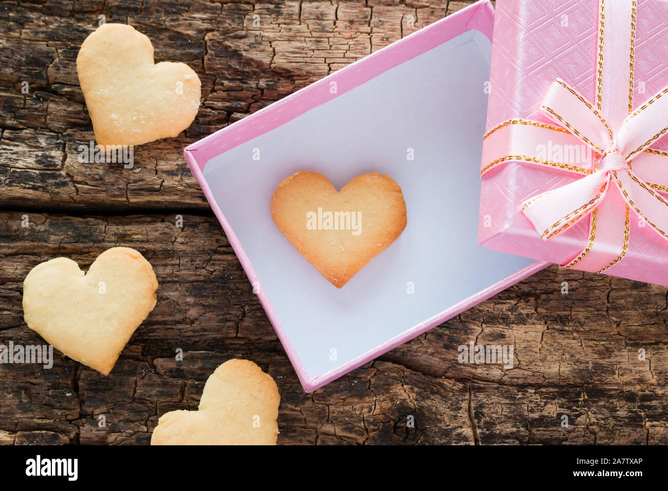 pink gift box with a heart-shaped cookies Stock Photo - Alamy